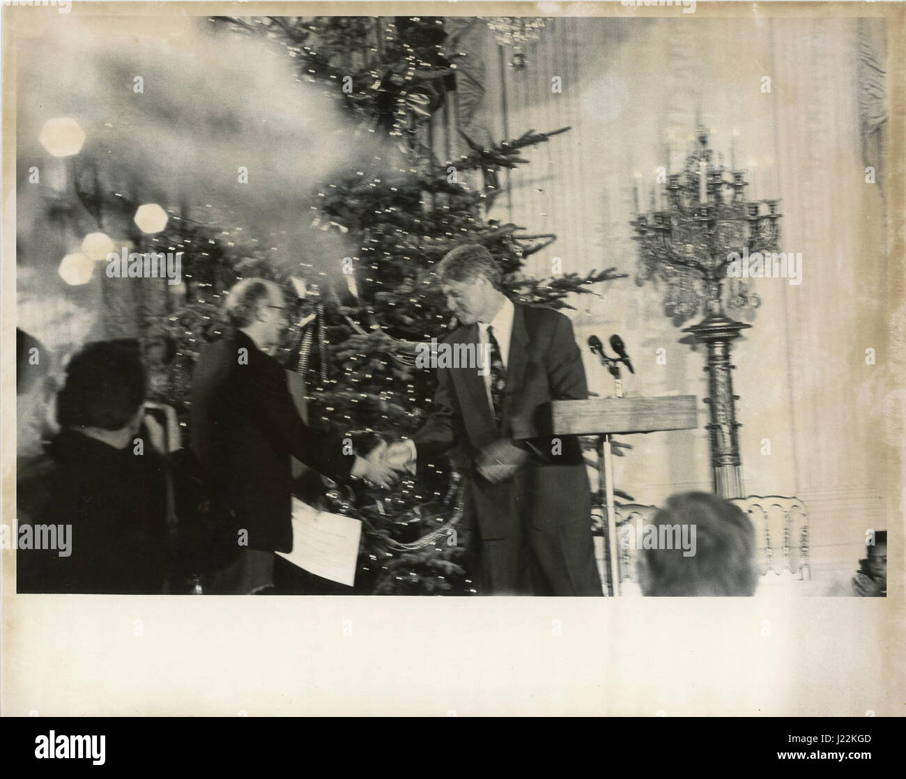 A government official and the President participated in a formal event ...