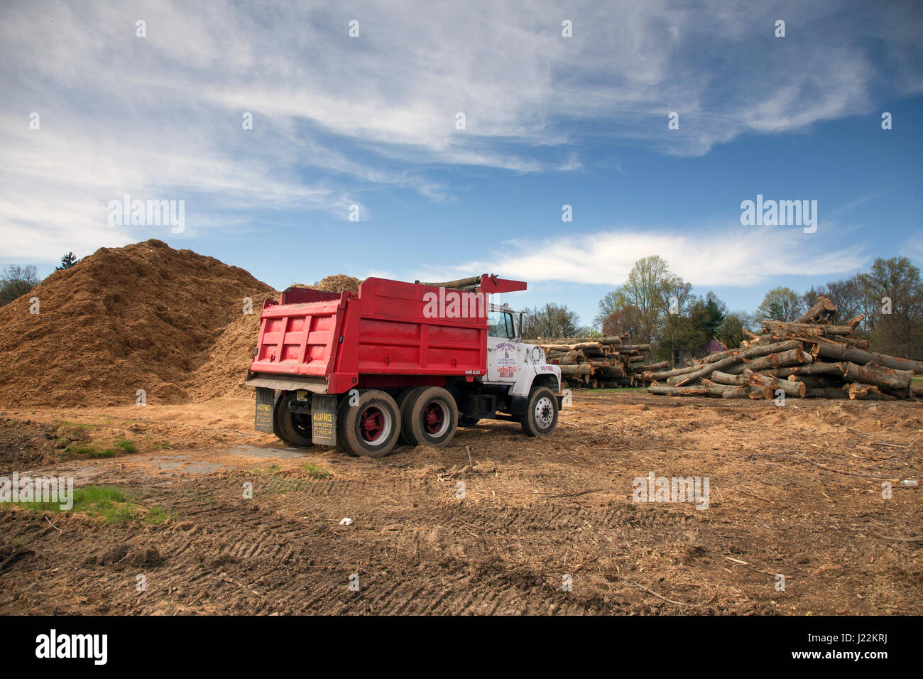 A dump truck at a construction site Stock Photo - Alamy
