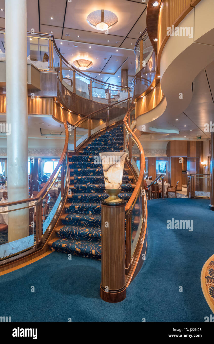 Cunard's Queen Mary 2 and the staircase in the Britannia Restaurant ...