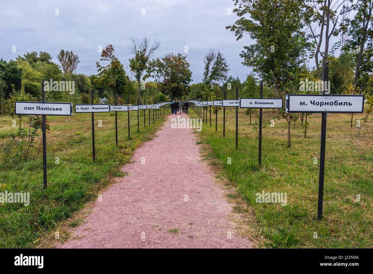 Alley with a signs of displaced villages in Chernobyl town, Chernobyl ...