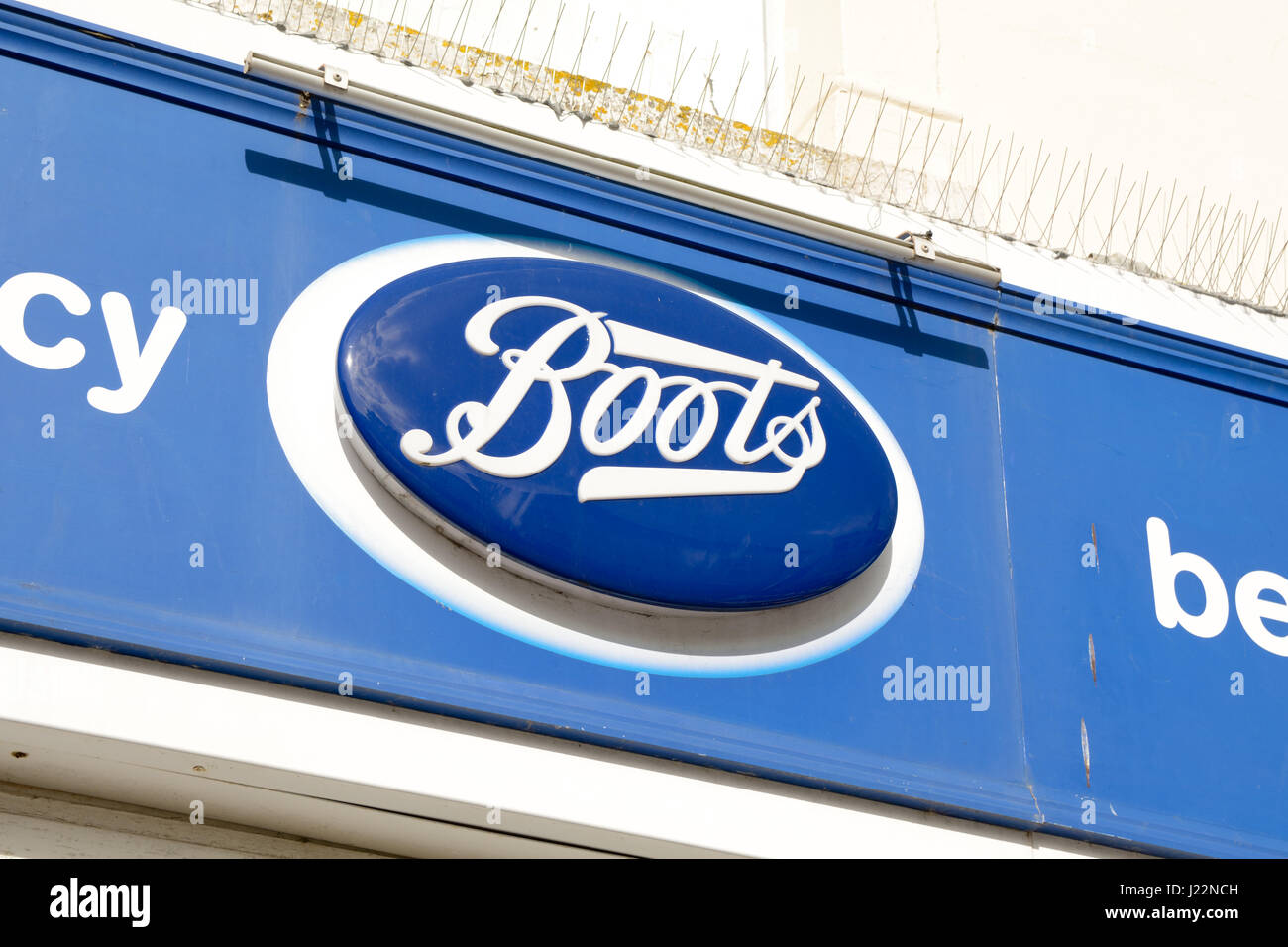 Blue boots shop sign hi-res stock photography and images - Alamy