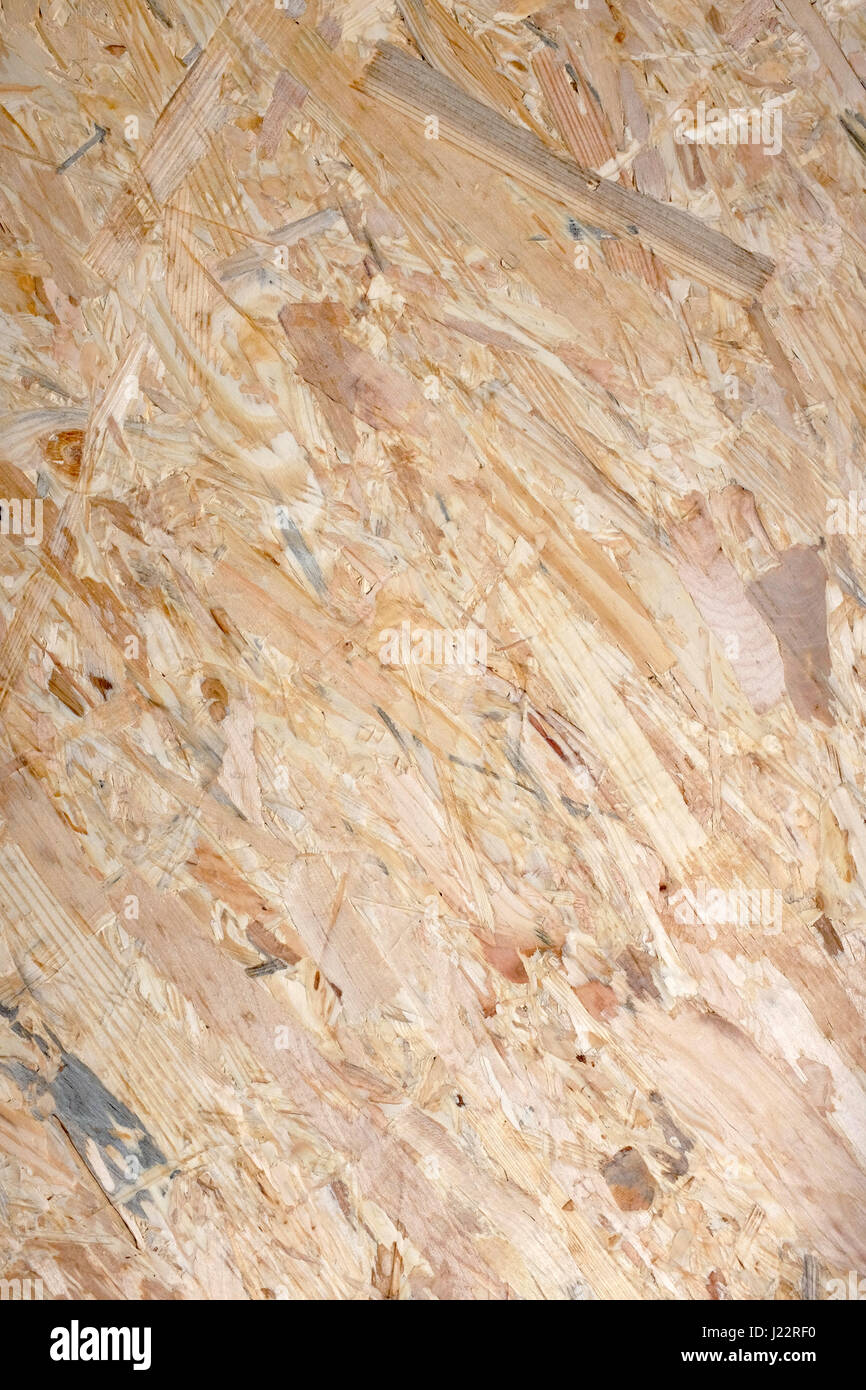 Oriented strand board background. Common building material formed from ...