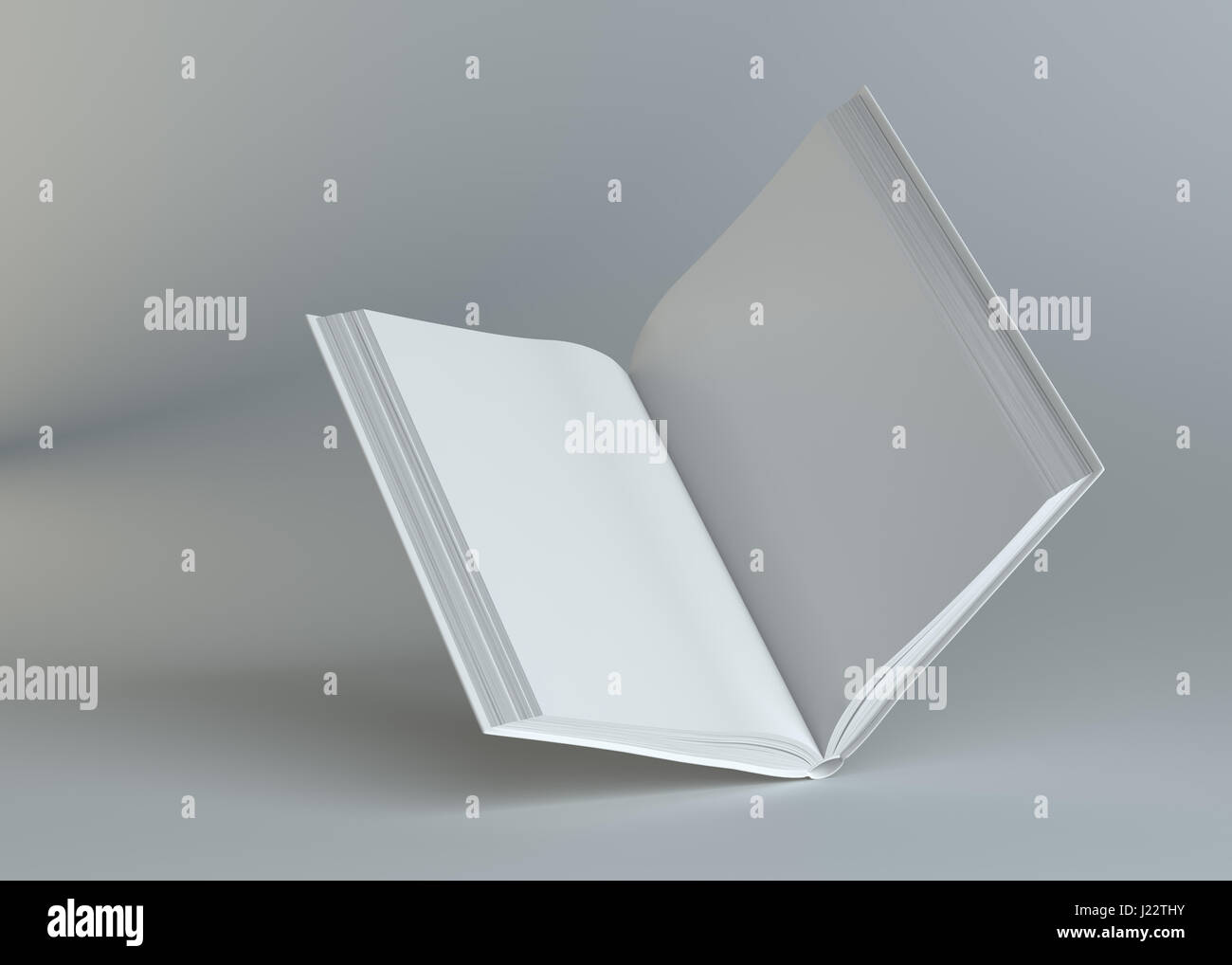 White empty open book on gray background Stock Photo - Alamy