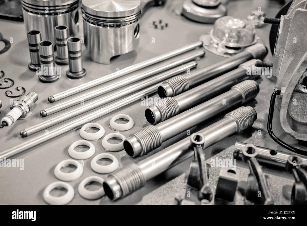 collection of precision auto engine parts laid out in a workshop Stock ...