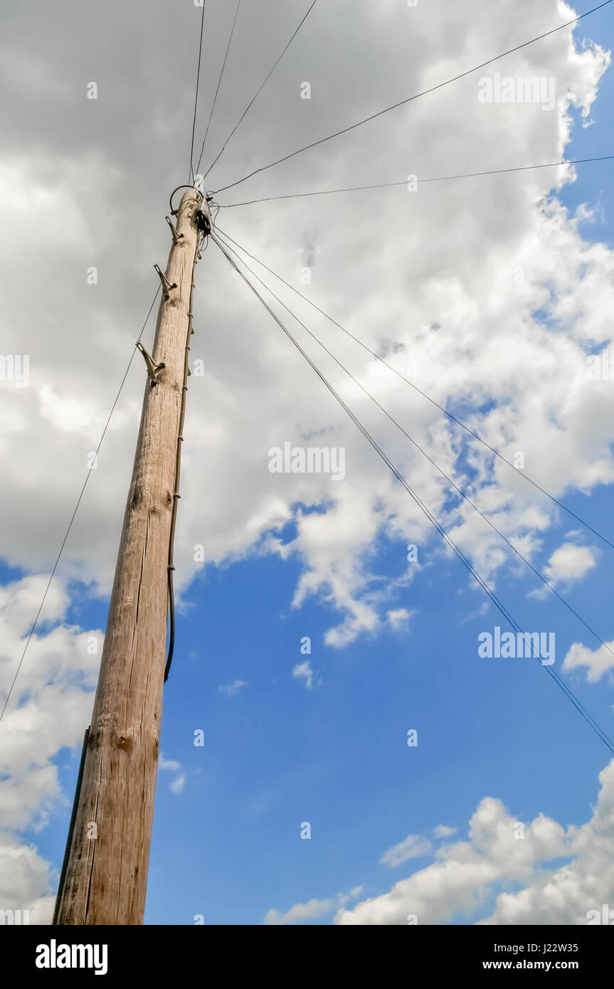 telephone utility pole against a cloudy sky Stock Photo - Alamy