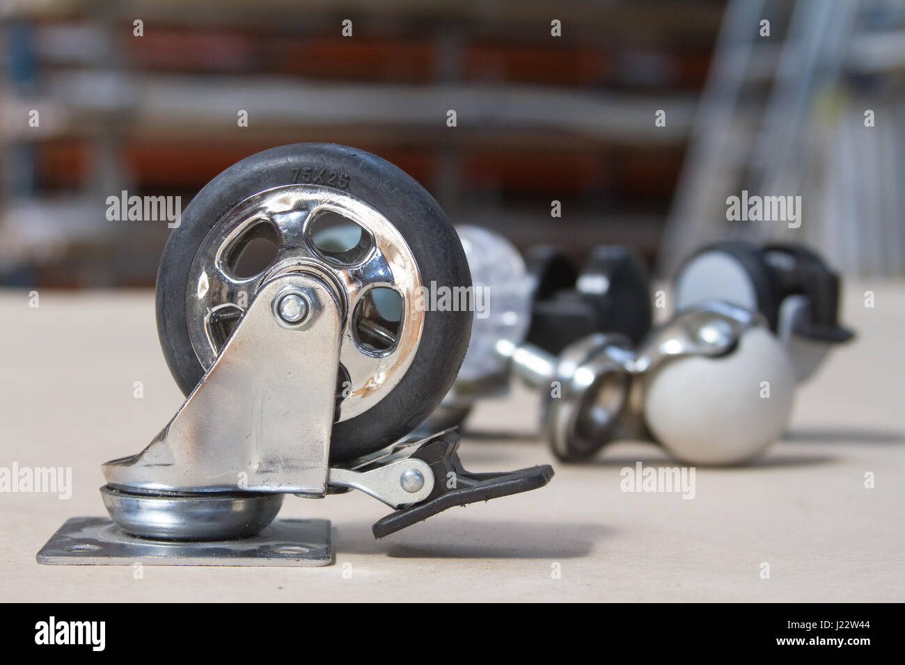 Wheel for sofa and tables. Roller for furniture Stock Photo - Alamy