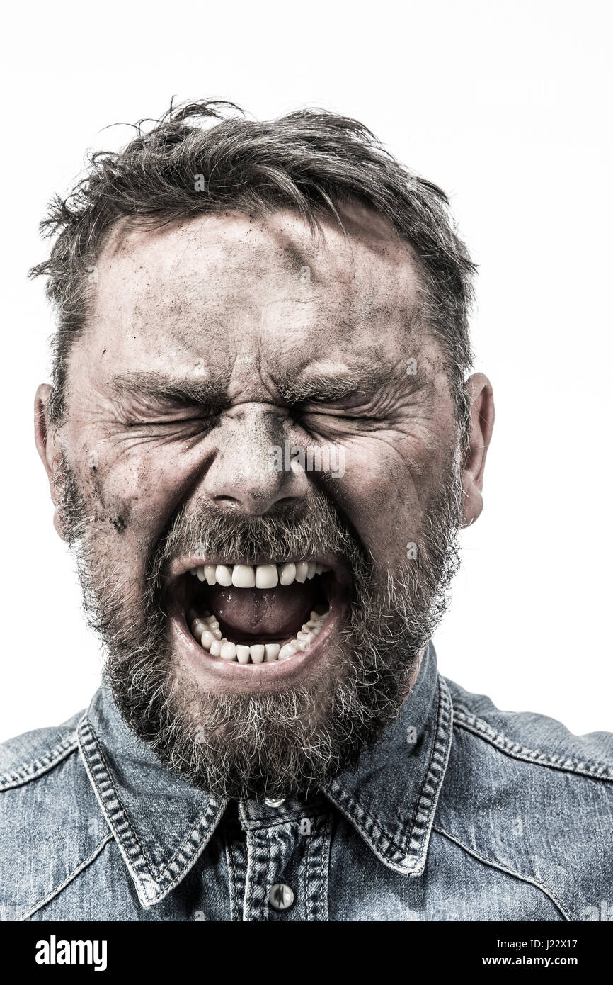 Portrait of screaming man with dirty face Stock Photo - Alamy