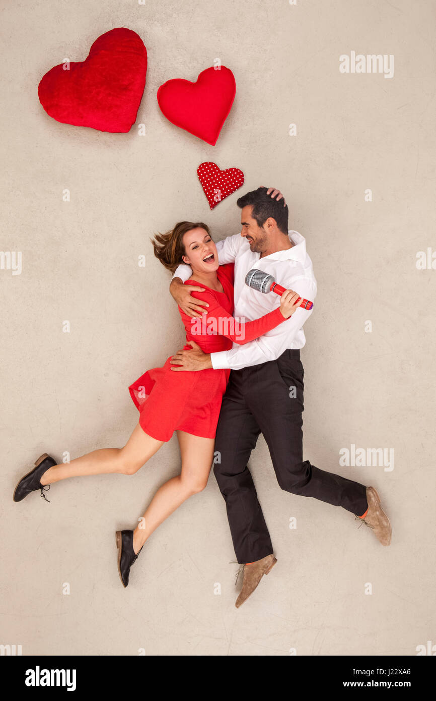 Couple singing a love song for each other Stock Photo - Alamy