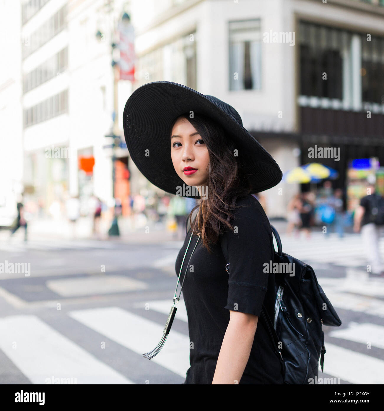 USA, New York City, Manhattan, portrait of fashionable young woman ...
