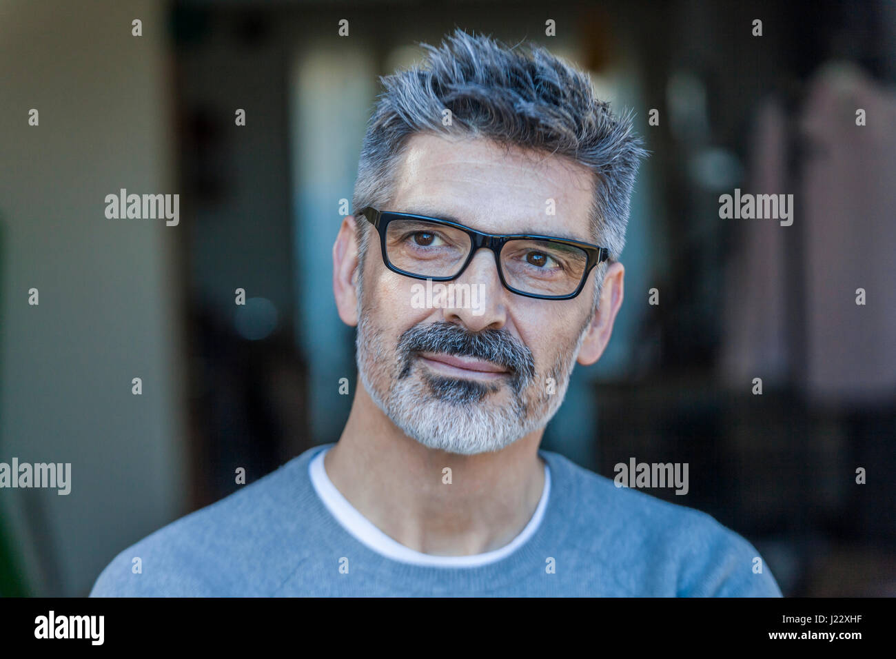 Portrait of mature man wearing glasses Stock Photo - Alamy