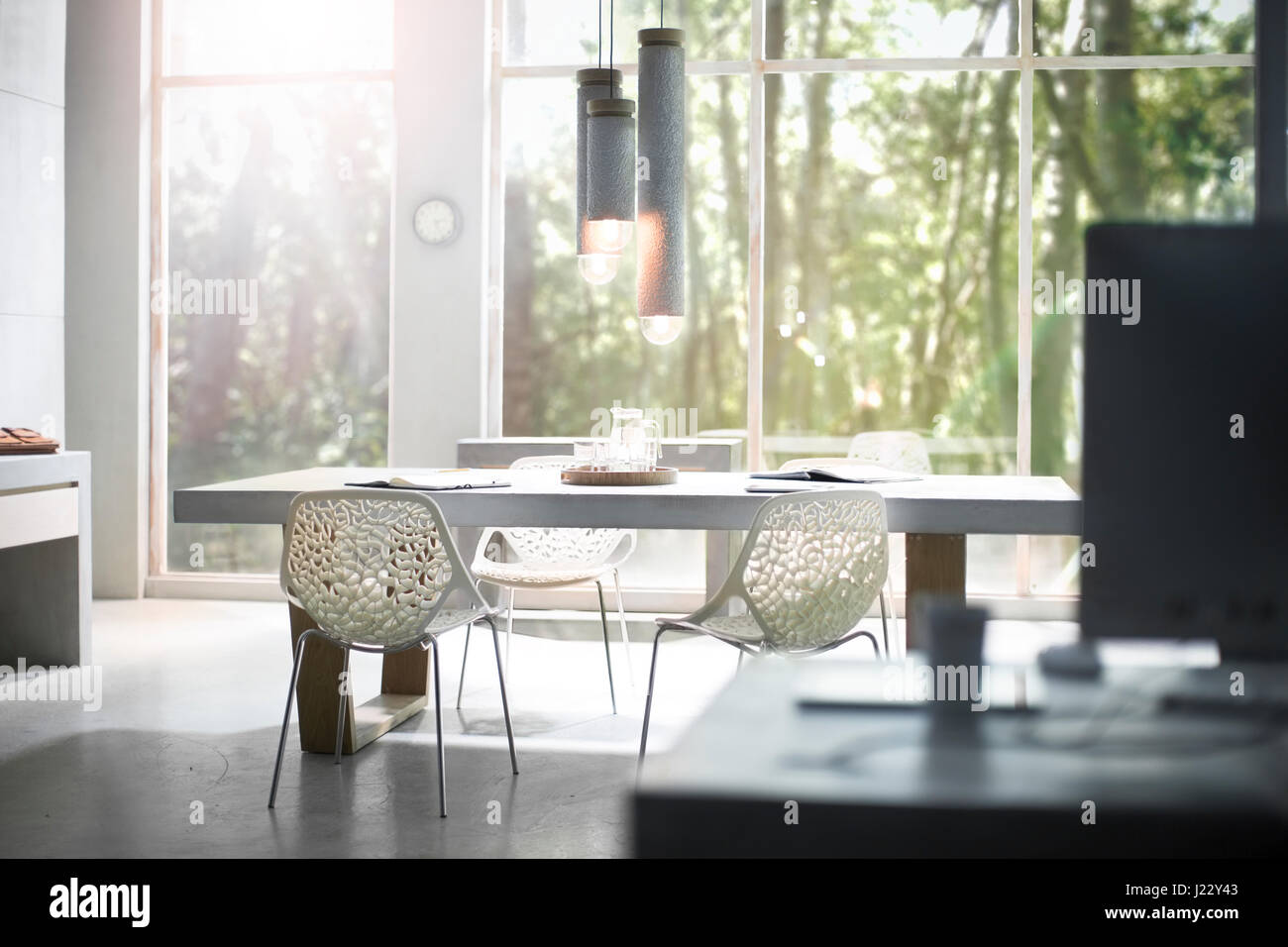 Interior of a modern office with nature view Stock Photo - Alamy