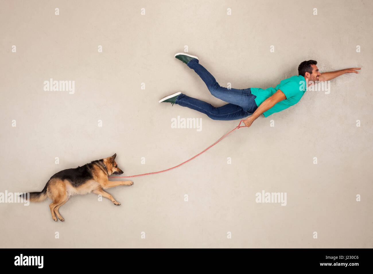 Man walking his dog Stock Photo - Alamy