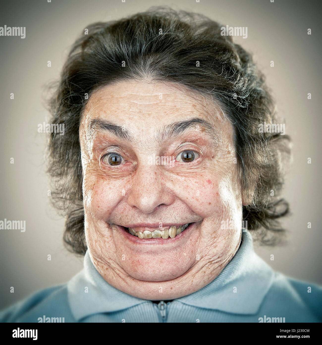Lady cheeky smile hi-res stock photography and images - Alamy
