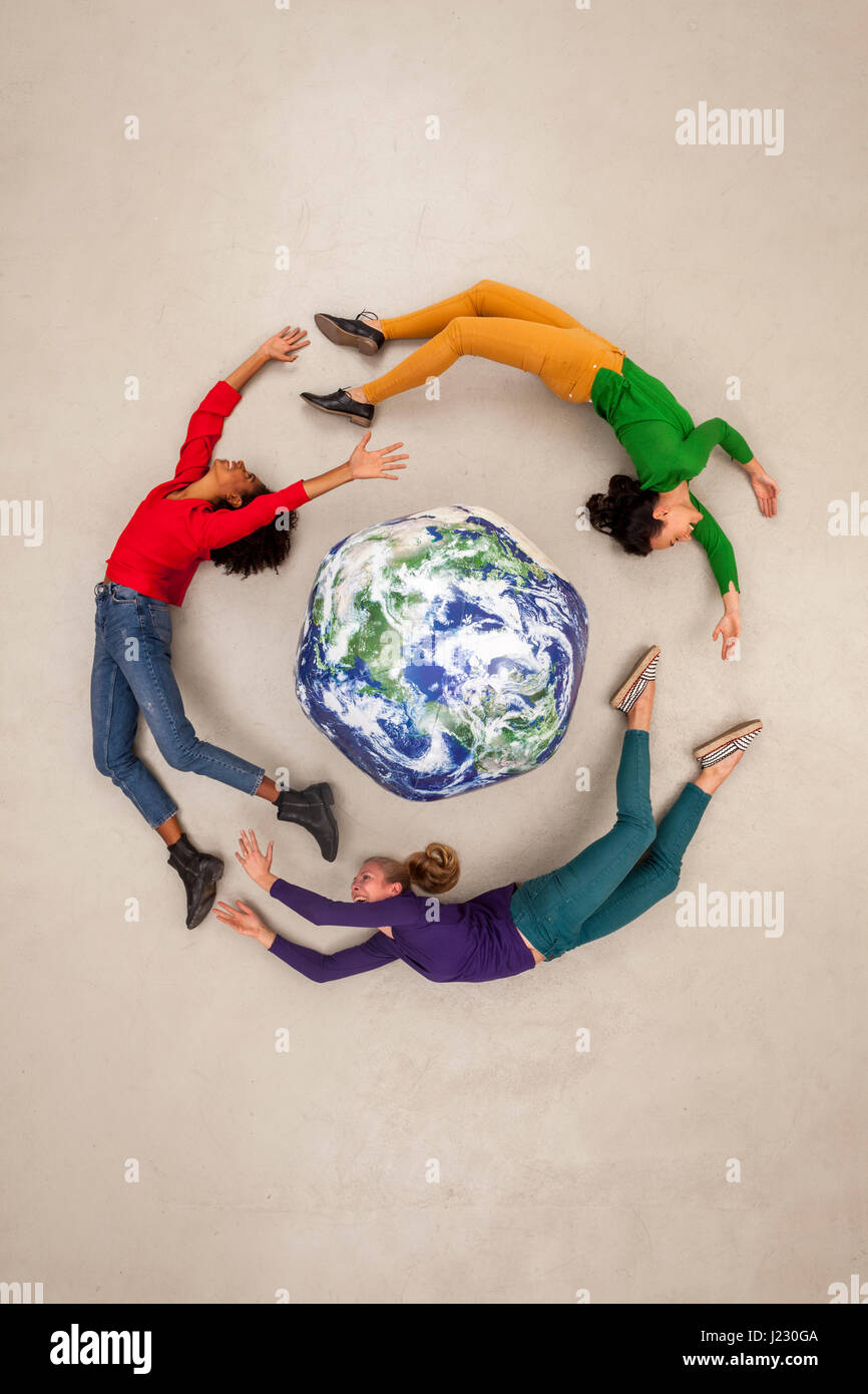 Three women flying aroung the world Stock Photo - Alamy