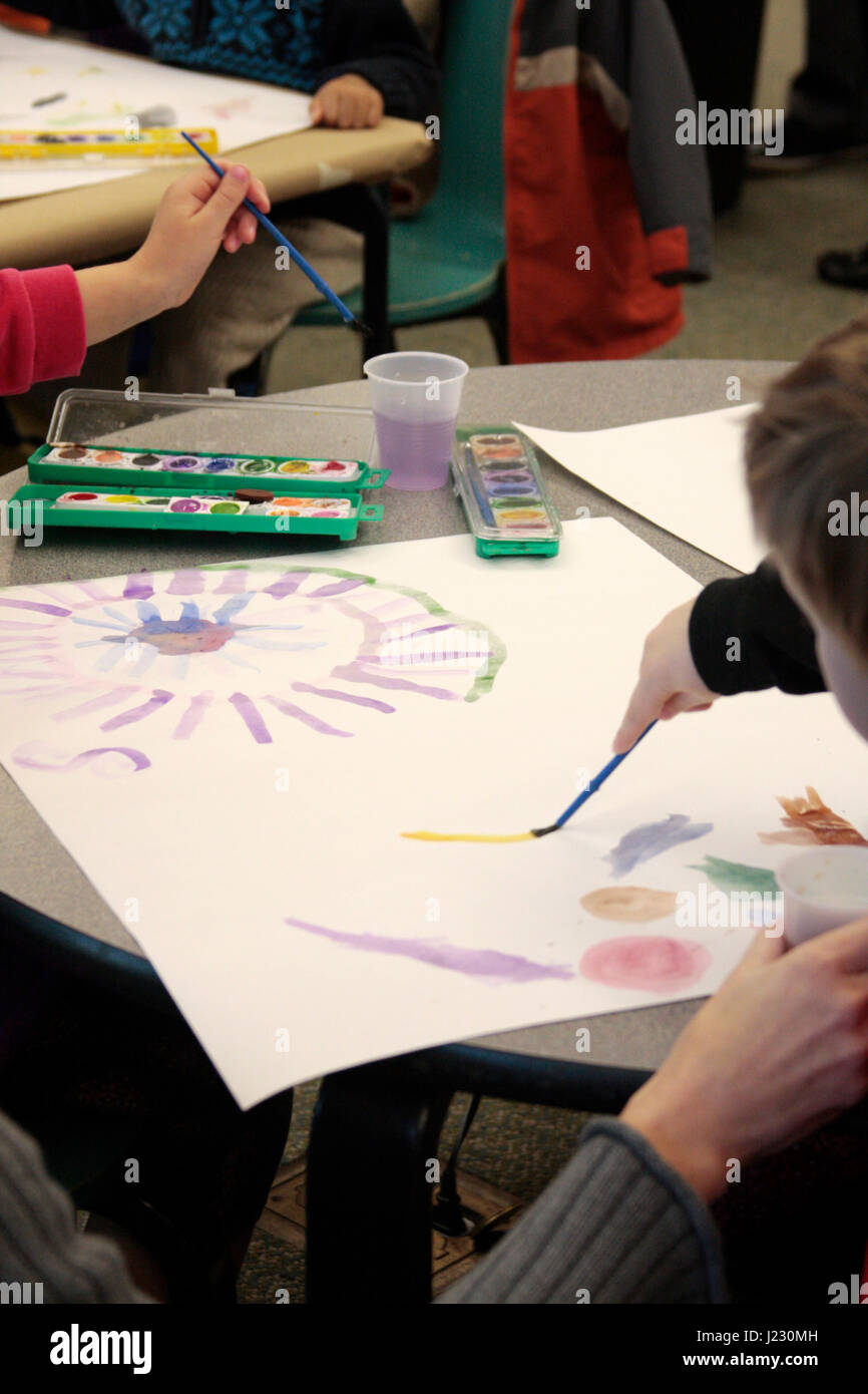 Children Painting with Water Colors Stock Photo - Alamy