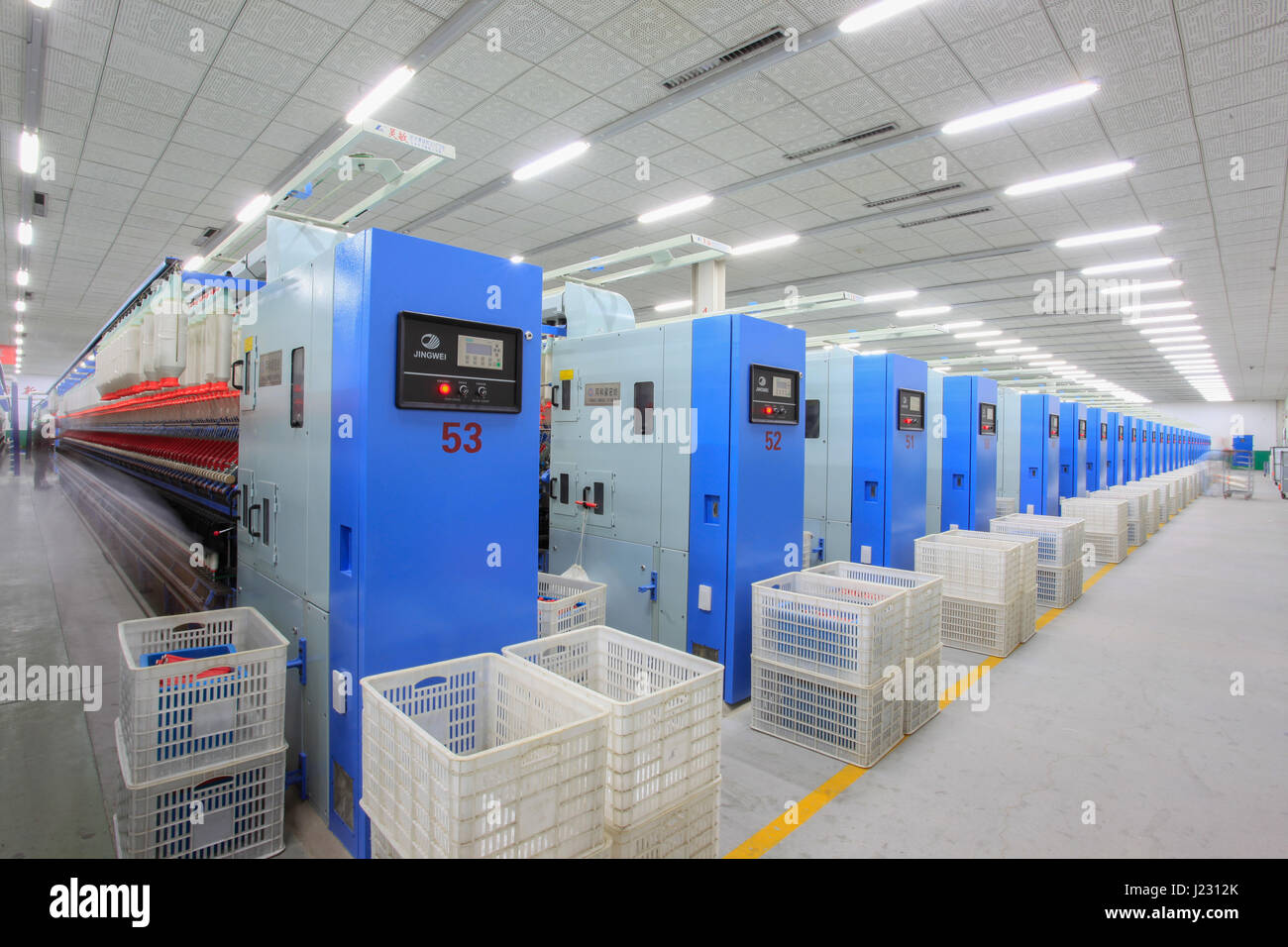 The spinning mill workshop equipment Stock Photo - Alamy