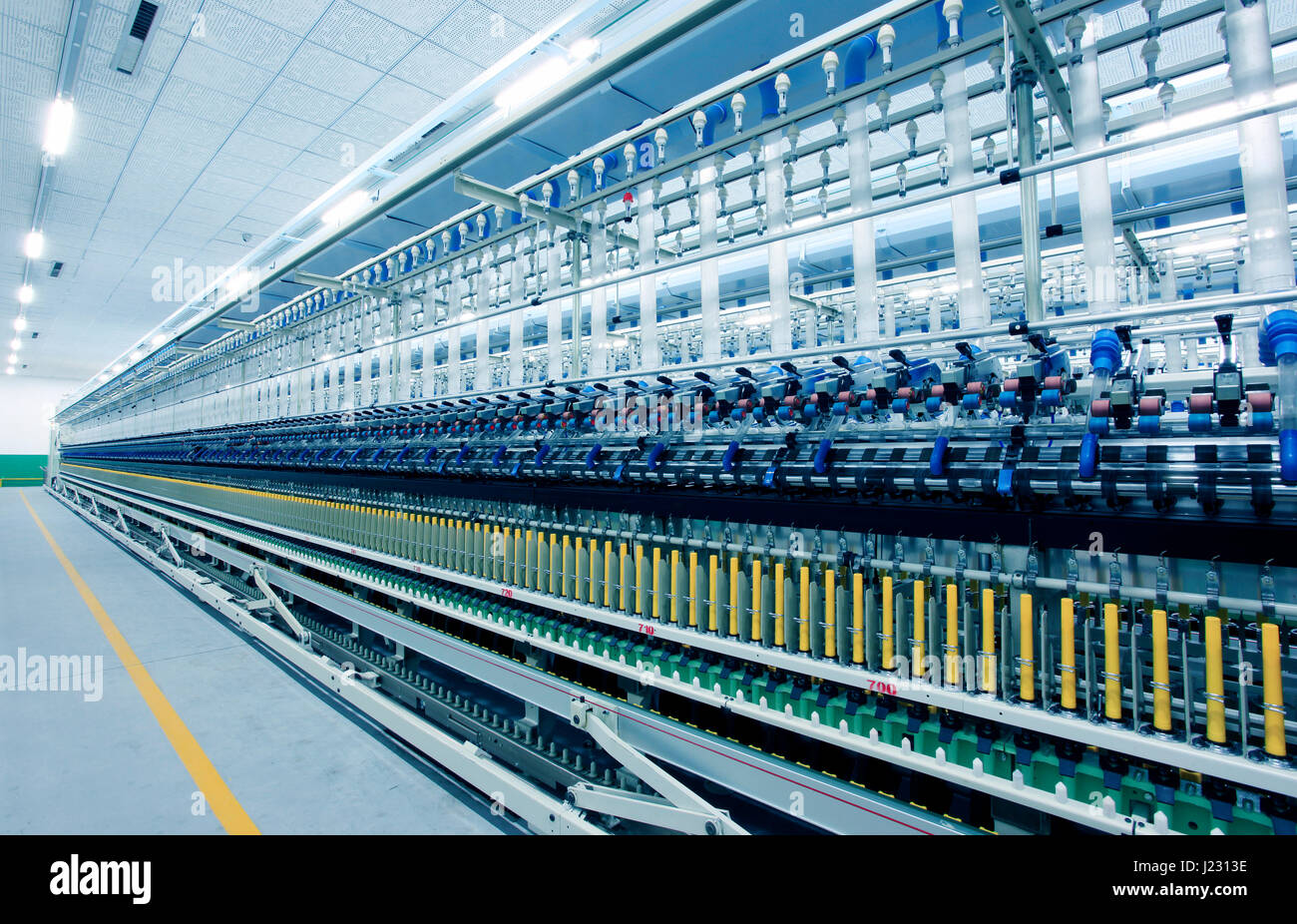 The spinning mill workshop equipment Stock Photo - Alamy