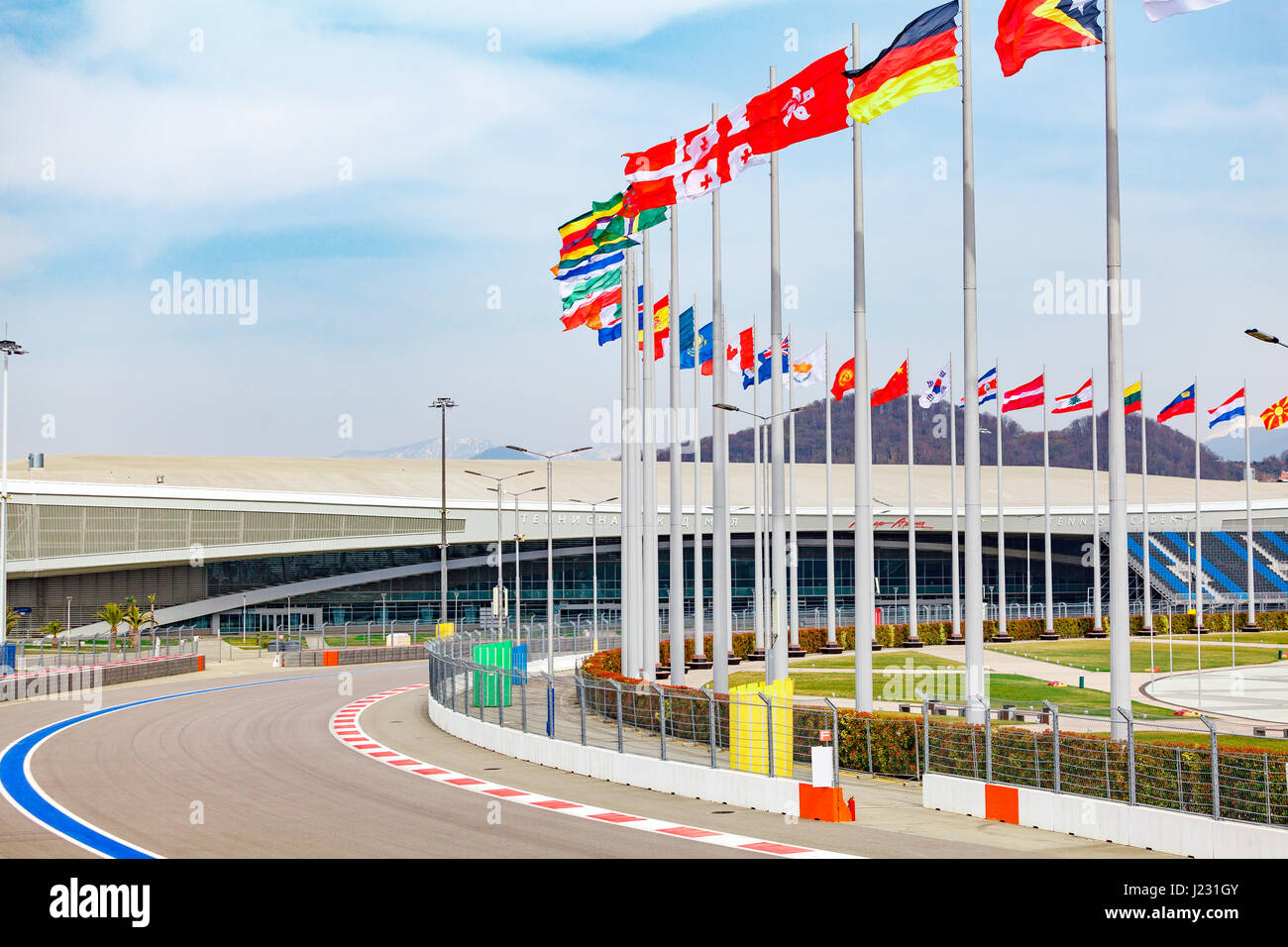 Motor racing track. Turning asphalt road with marking lines Stock Photo ...
