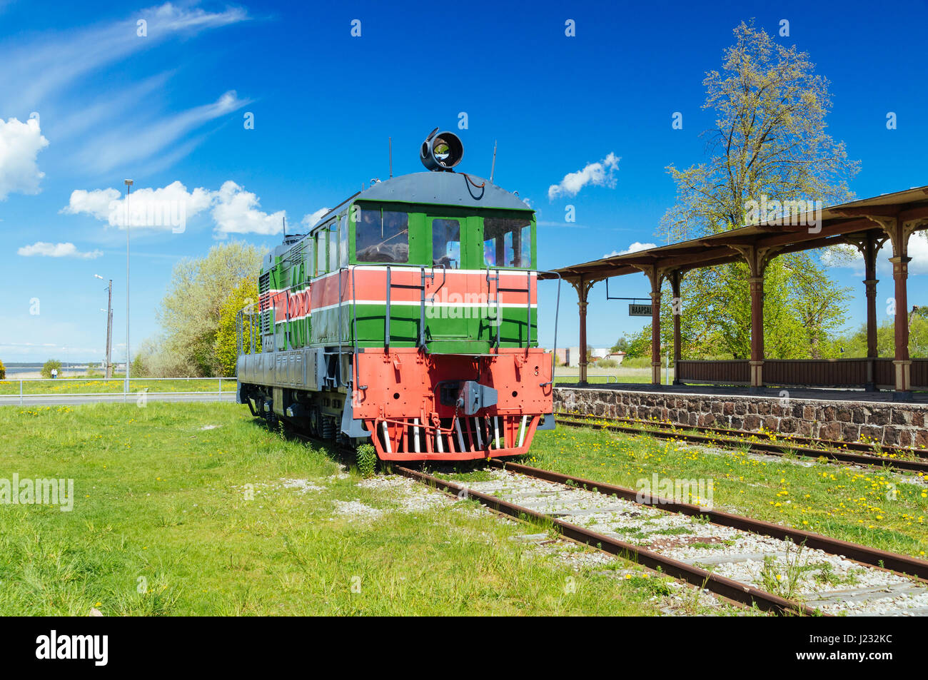 Old style retro locomotive train by sunny springtime day Stock Photo ...