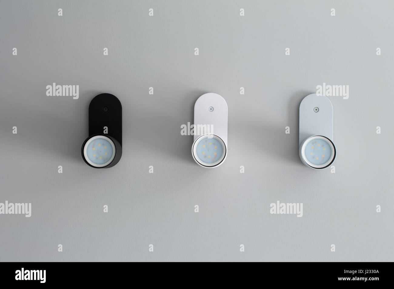 Three lamps on ceiling Stock Photo - Alamy