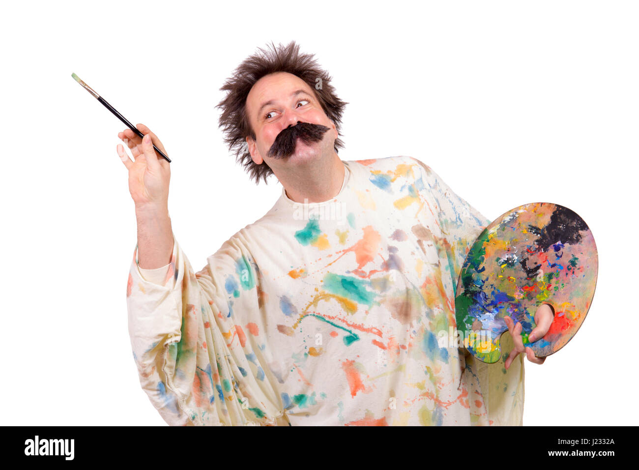 Happy painter is inspired when painting, isolated on white background ...