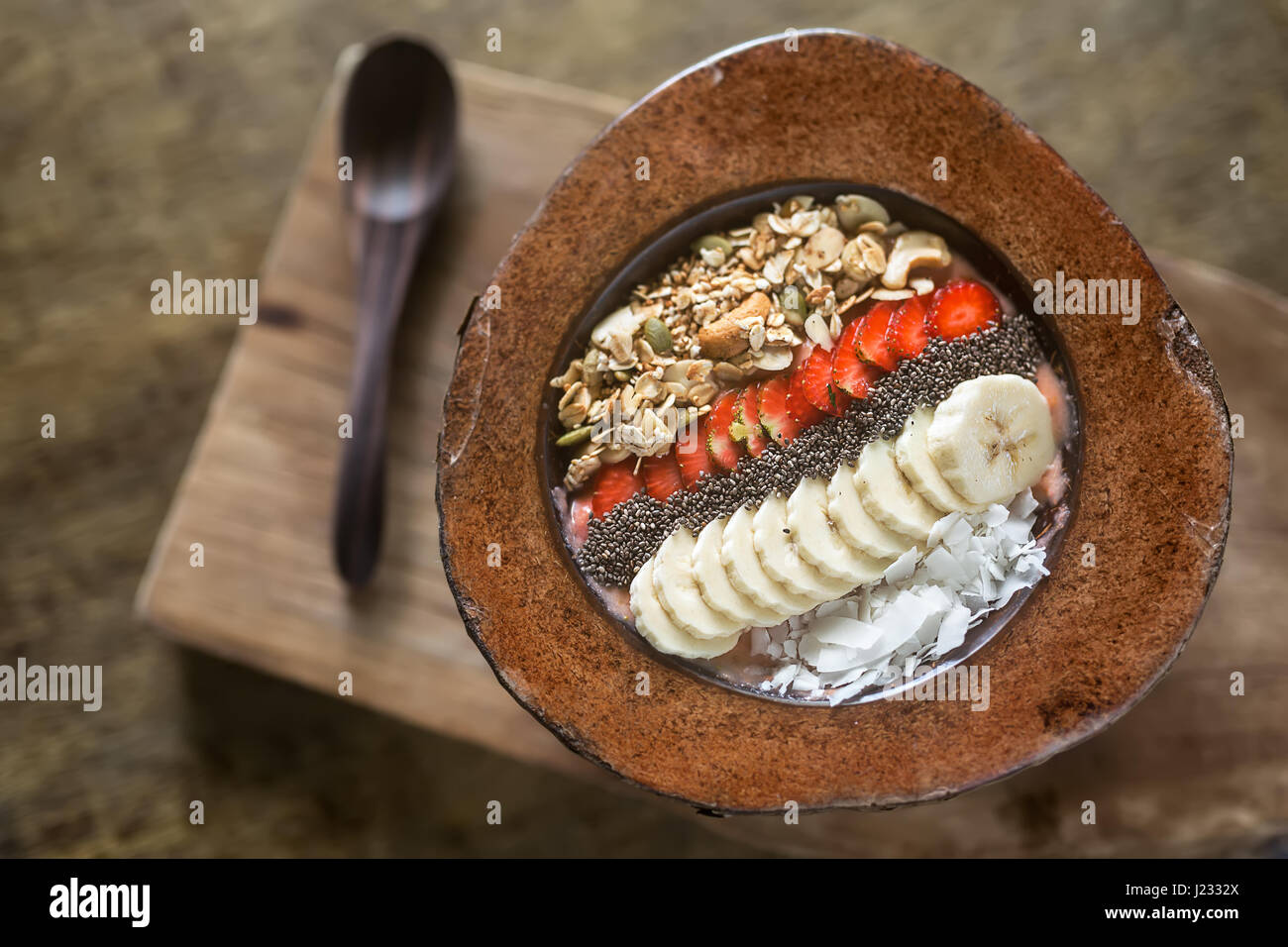 Fruit mix in coconut plate Stock Photo - Alamy