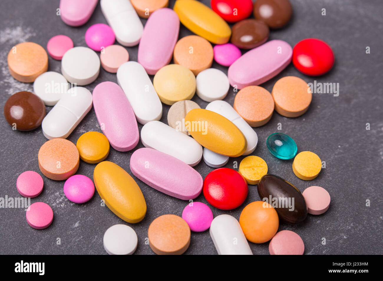 different tablets pills capsule heap mix therapy drugs Stock Photo - Alamy