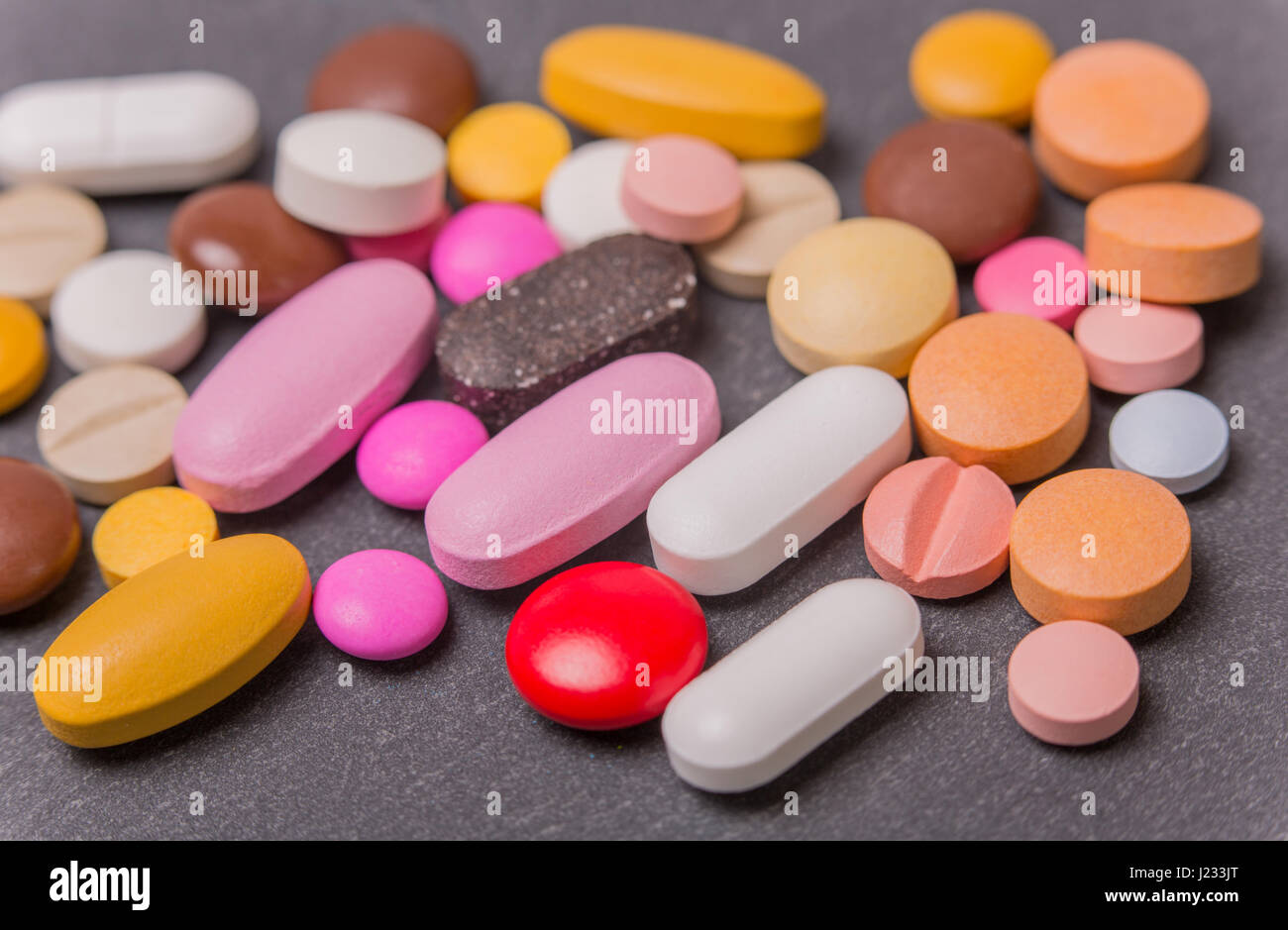 different Tablets pills capsule heap mix therapy drugs Stock Photo - Alamy