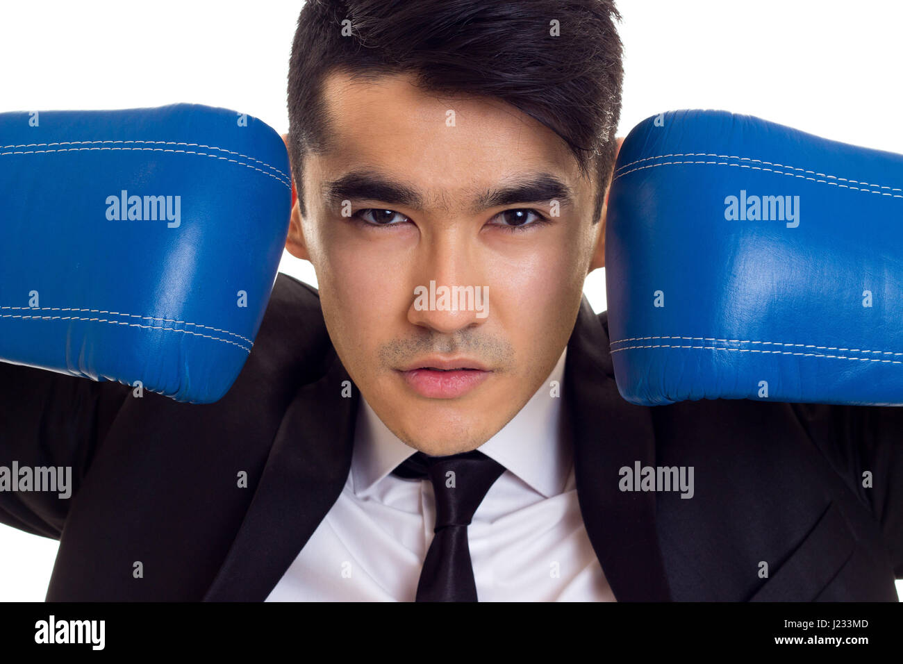 Young man in suit with boxing gloves Stock Photo - Alamy