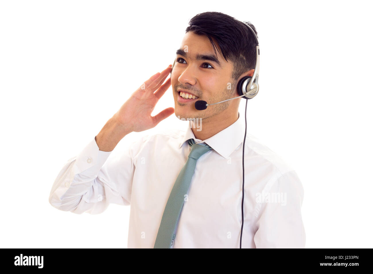 Young man using headphones Stock Photo - Alamy