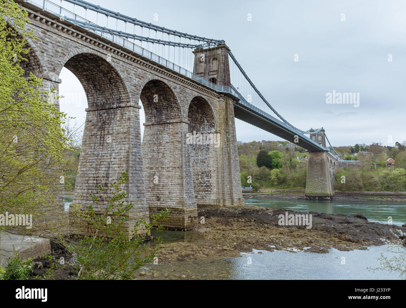 View of the Menai Bridge on Anglesey Stock Photo - Alamy