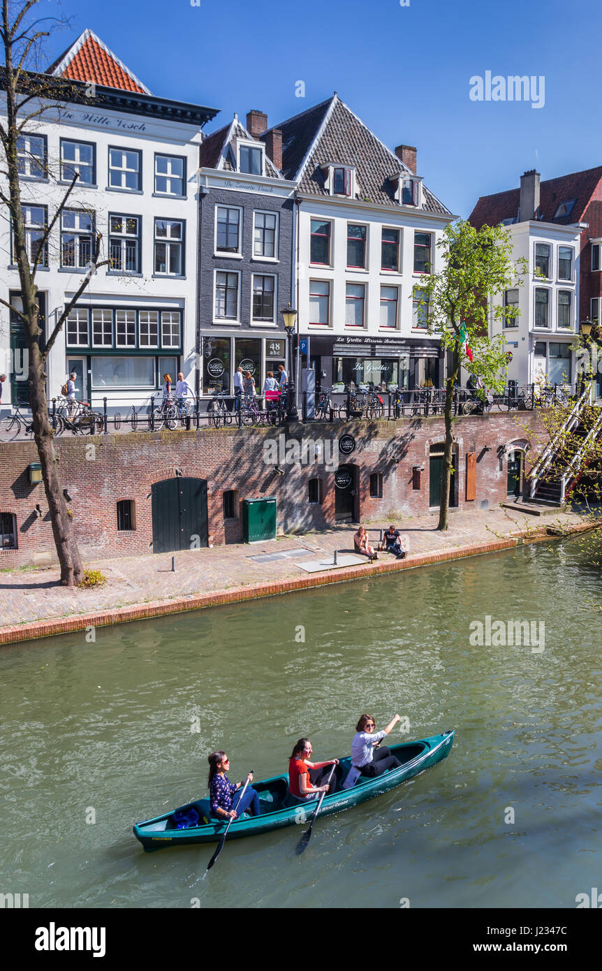 Tourists in a canoe in the historic canals of Utrecht, Holland Stock ...