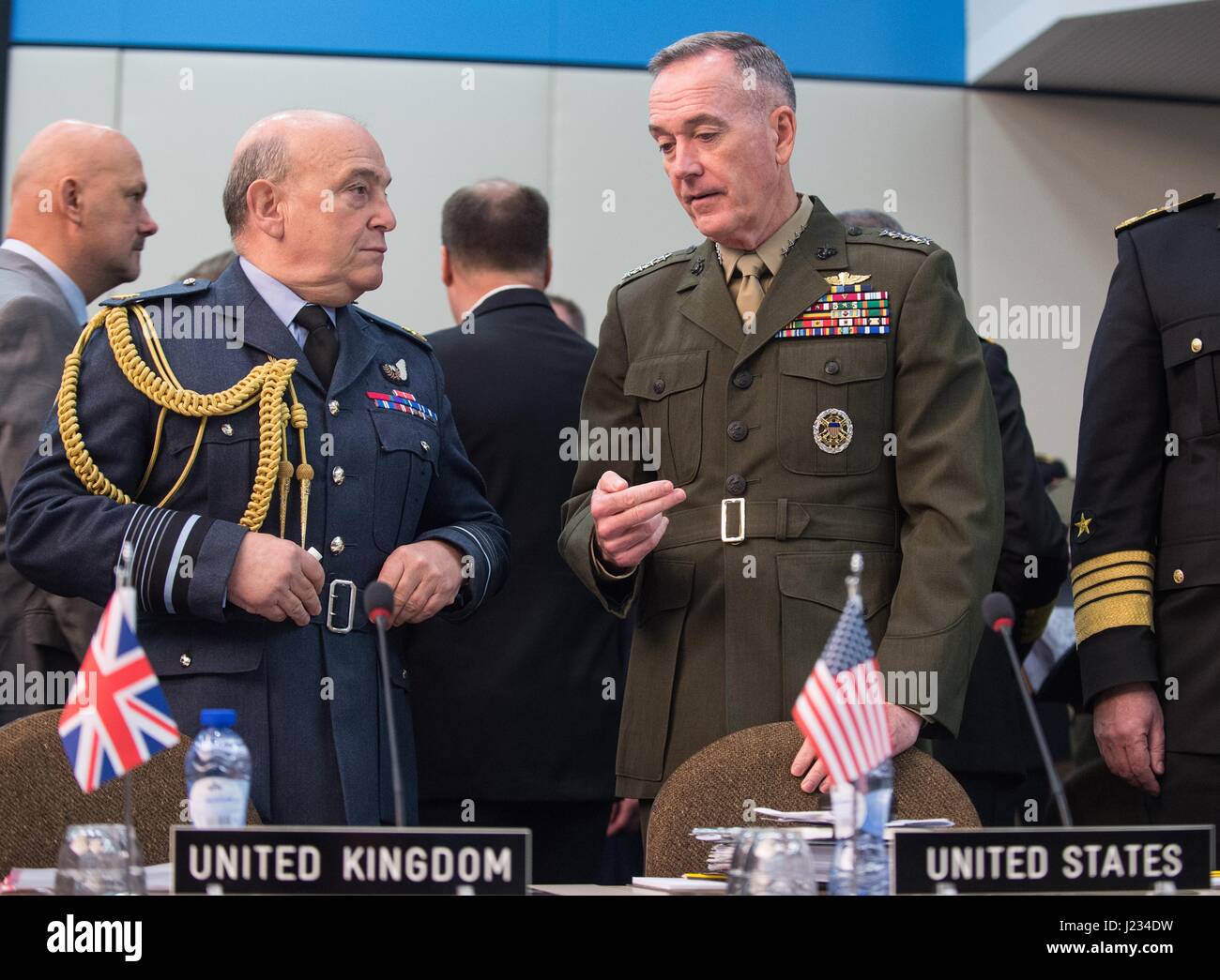 U.S. Joint Chiefs of Staff Chairman Joseph Dunford (right) speaks with ...