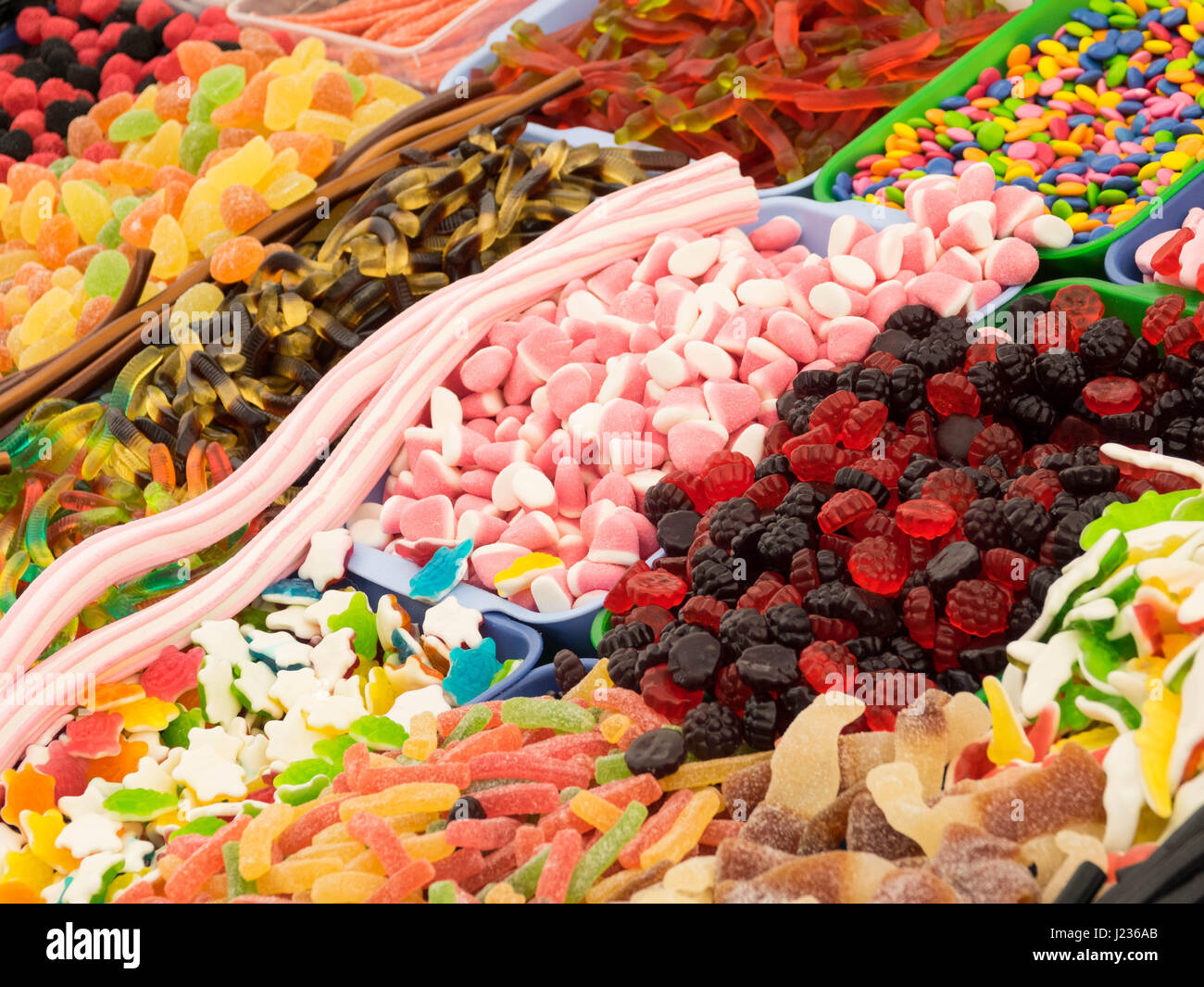 Close up of candies assorted colors background Stock Photo - Alamy
