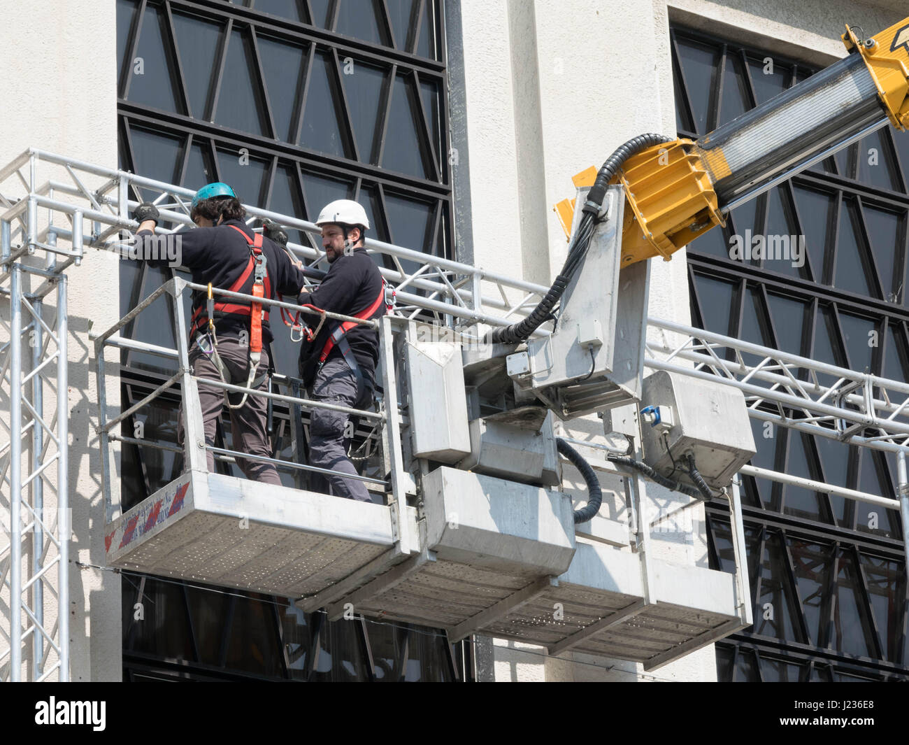Worker on aerial access platform hi-res stock photography and images ...