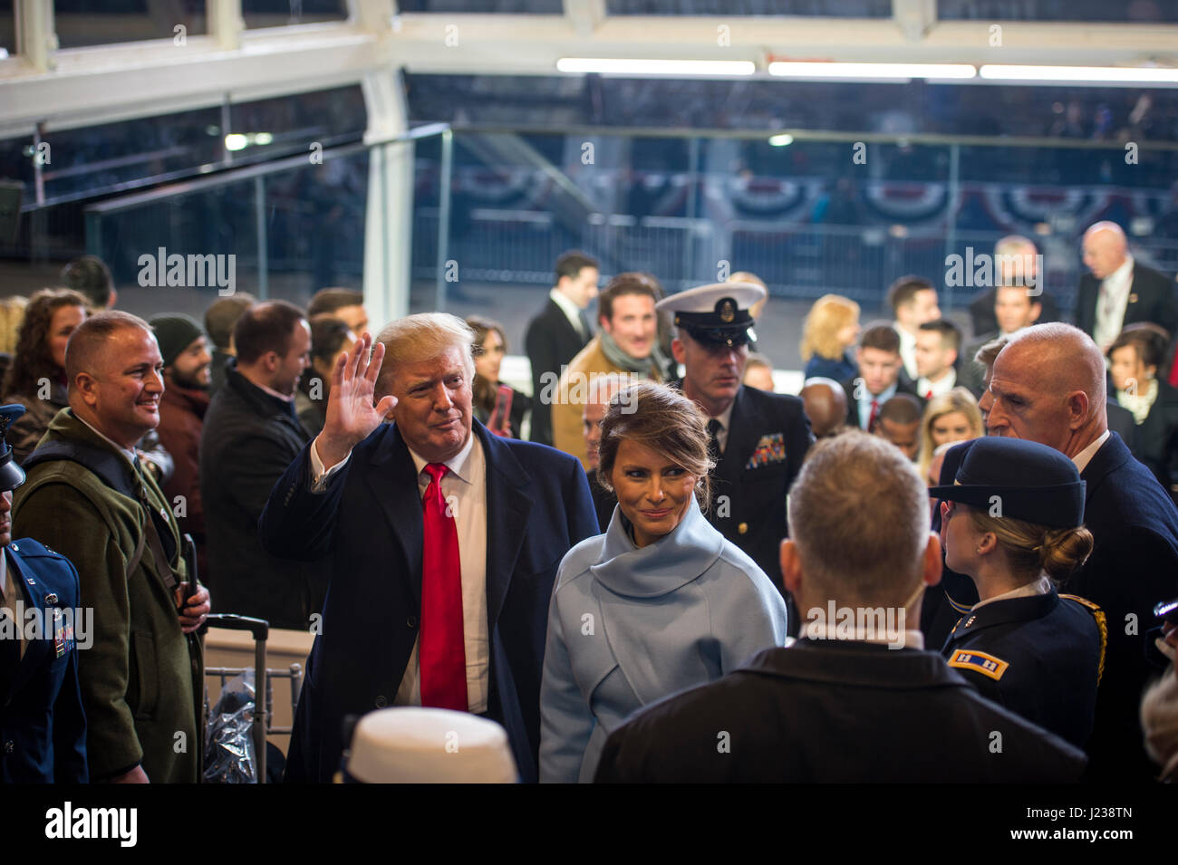 U.S. President Donald Trump and First Lady Melania Trump wave at the ...