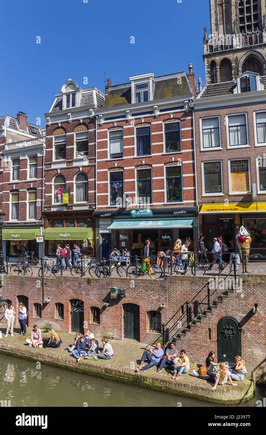 People enjoying the sun at the canals of Utrecht, Holland Stock Photo ...