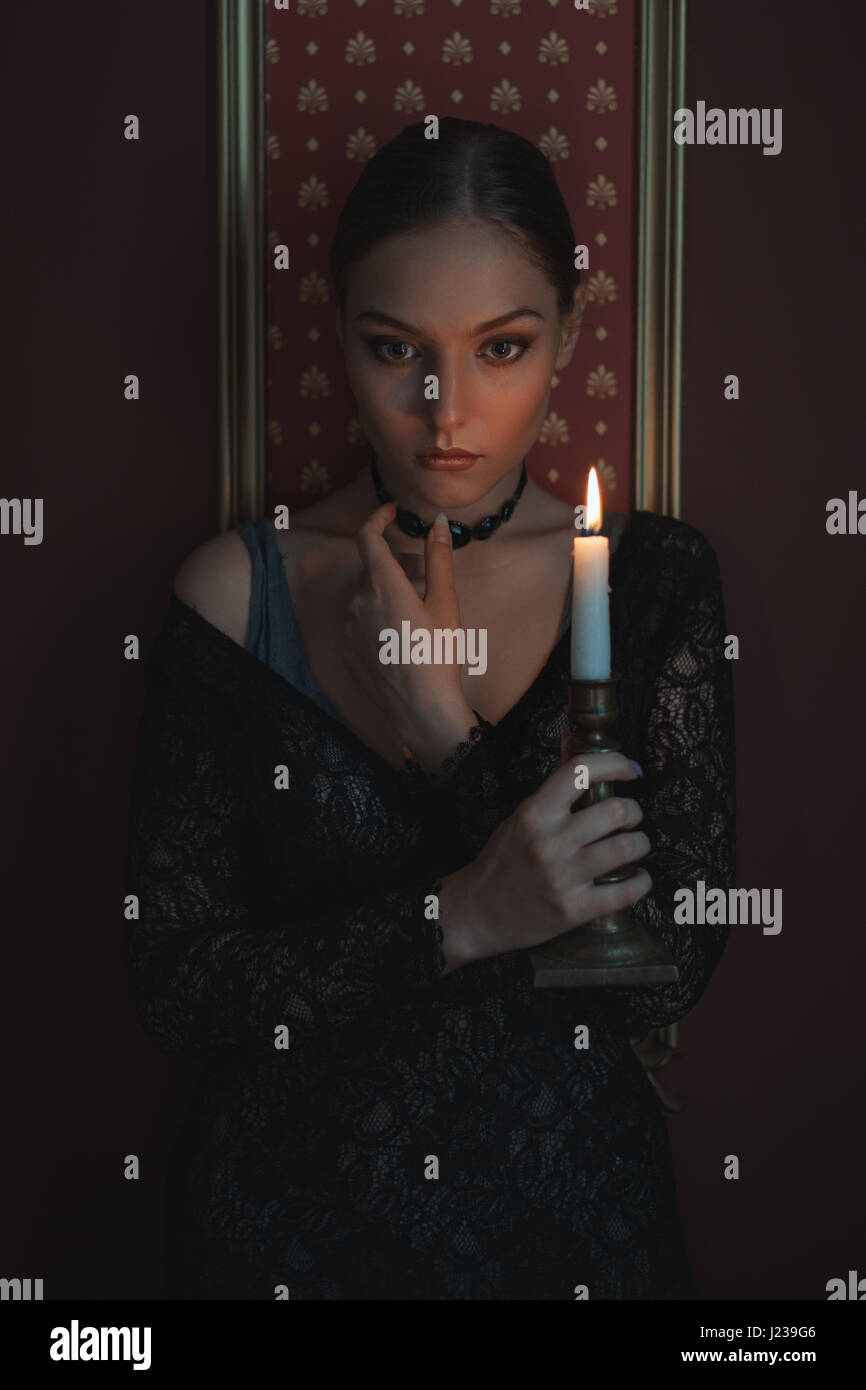 Woman in dark room hi-res stock photography and images - Alamy
