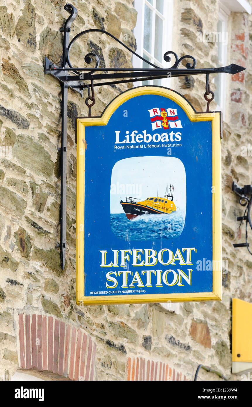 Hanging sign at the Lifeboat station and shop in Salcombe, Devon Stock ...