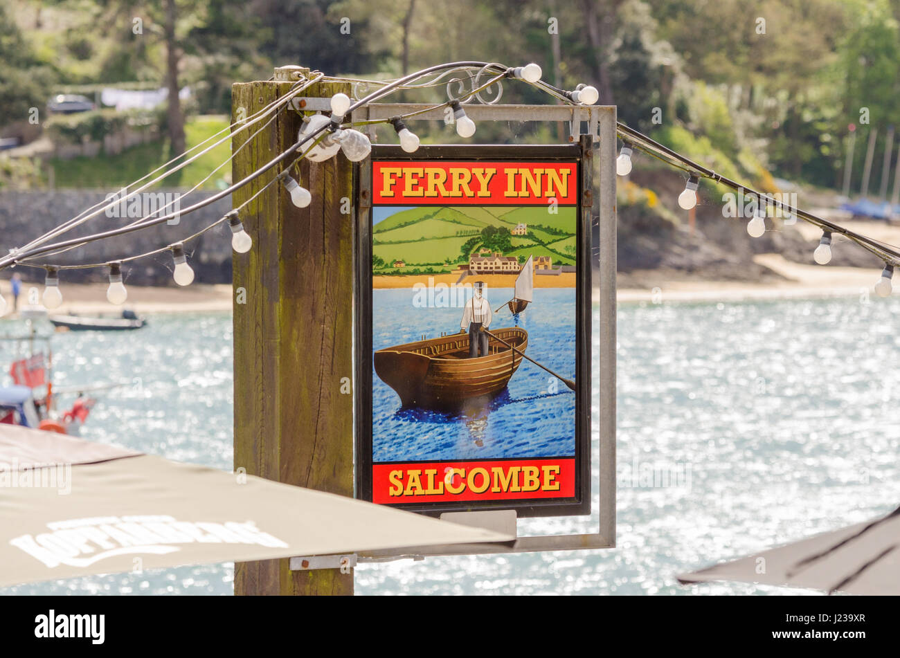 Colourful hanging sign for the Ferry Inn pub in Salcombe, Devon Stock ...