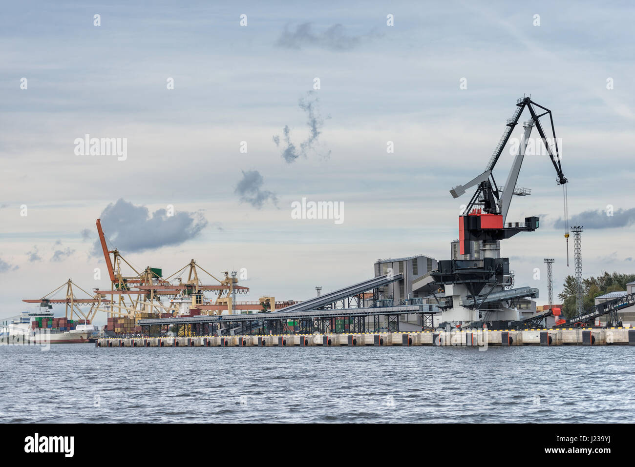 Container transshipment at port Stock Photo - Alamy