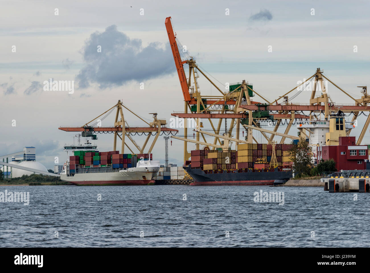 Container transshipment at port Stock Photo - Alamy