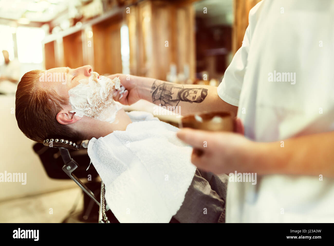 Retro shaving with foam in barber shop Stock Photo - Alamy