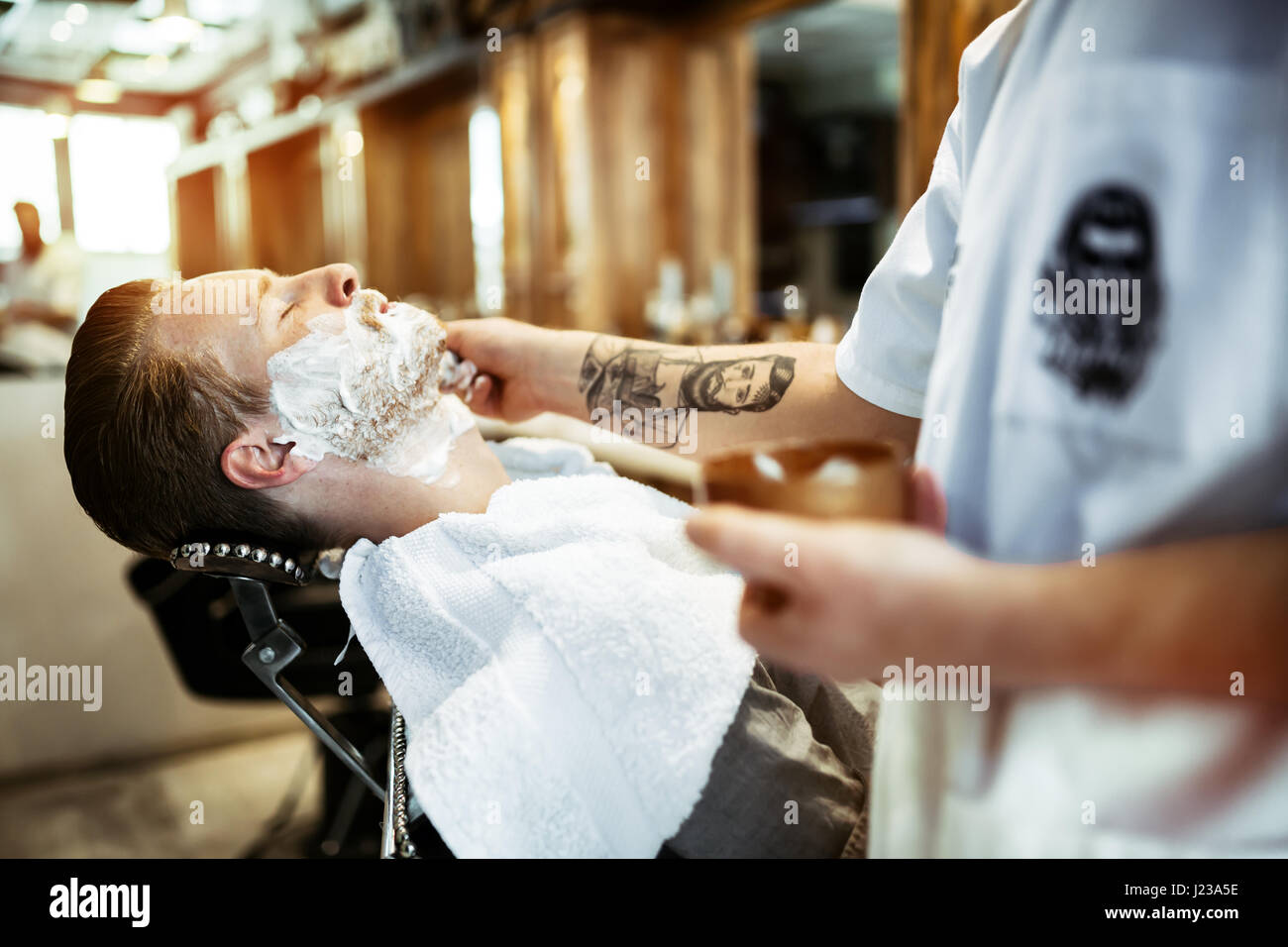 Male in barber shop taking care of hair mustache and beard Stock Photo ...