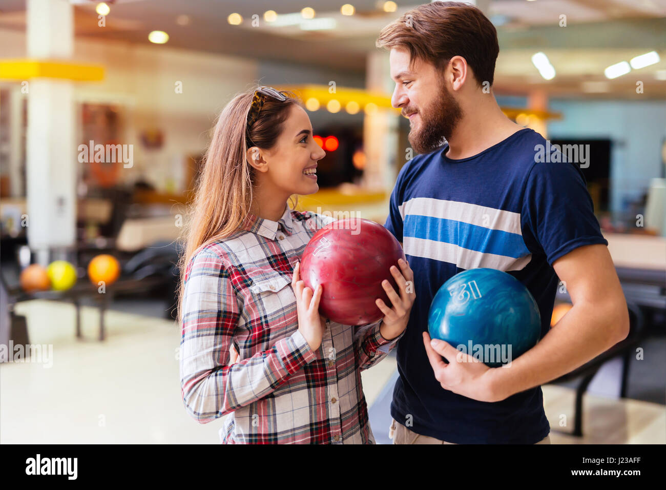 Beautiful couple in love dating and bowling Stock Photo - Alamy