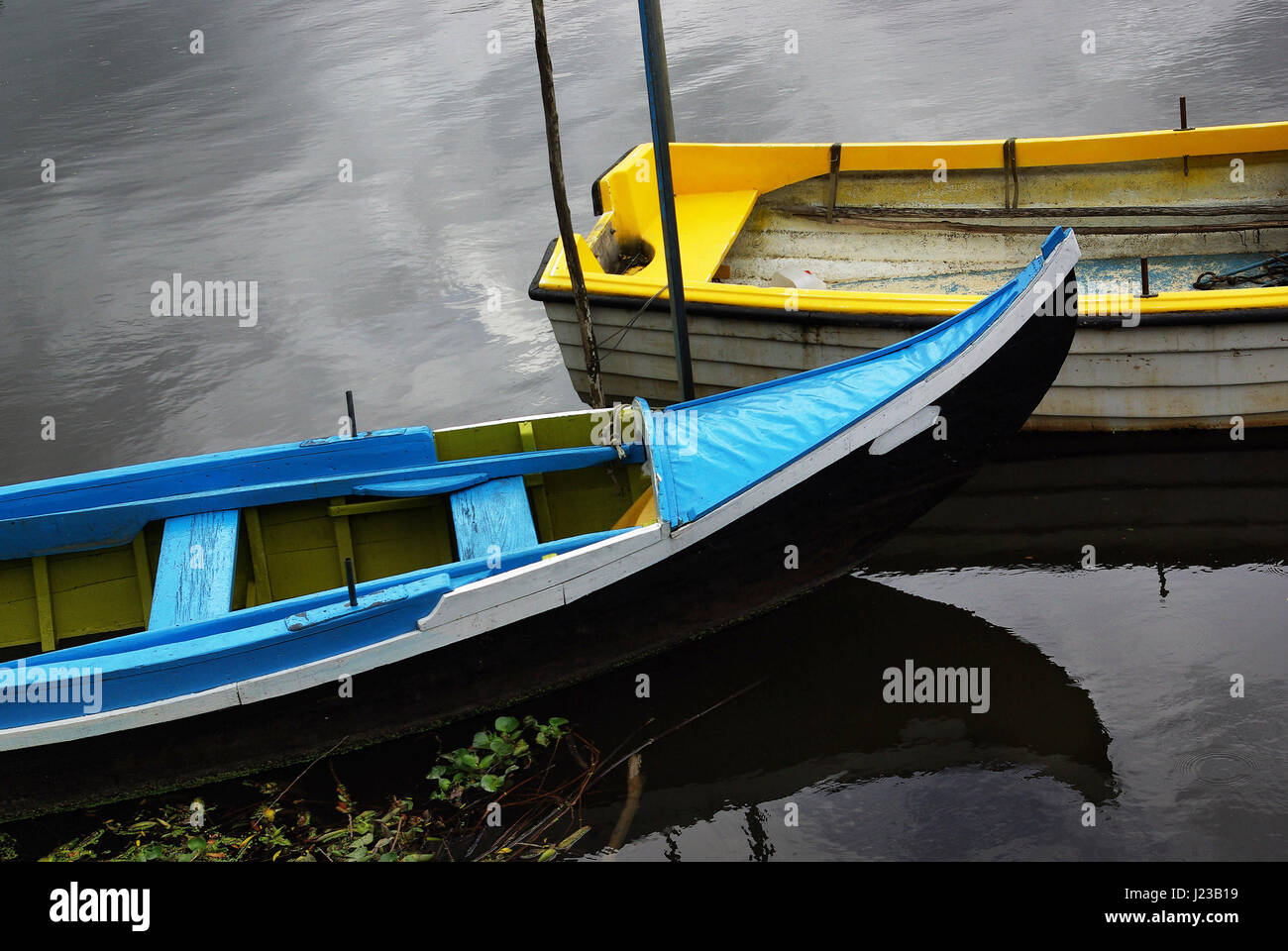 Anchored boat hi-res stock photography and images - Alamy