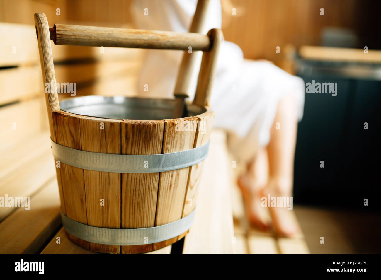 Finnish wooden sauna bucket Stock Photo - Alamy