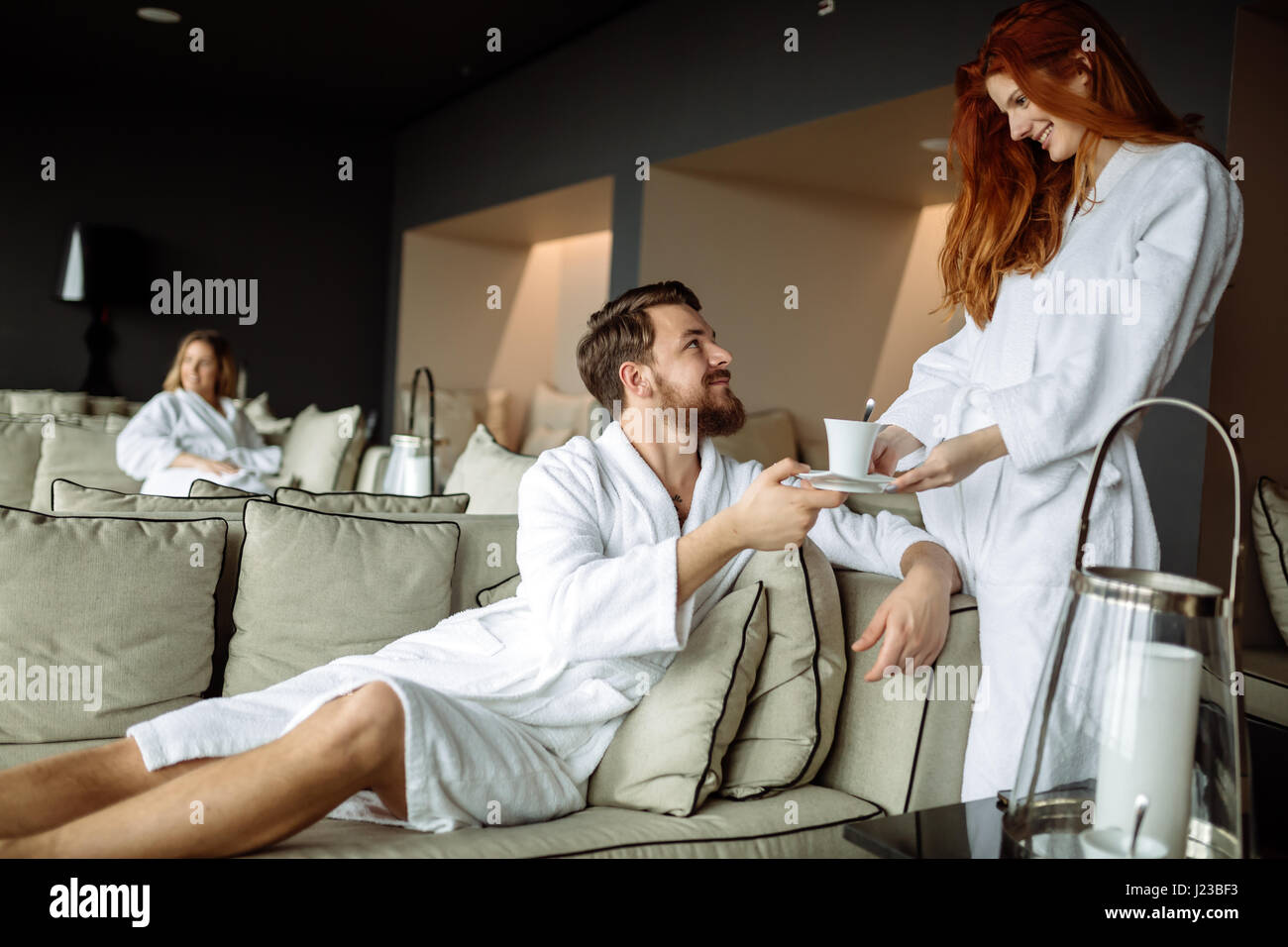 Handsome man drinking tea in morning resting room Stock Photo - Alamy