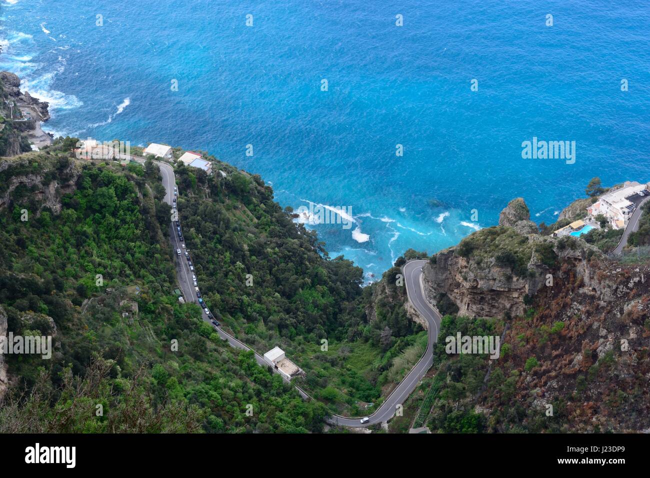 Narrow winding road on cliff edge the Amalfi Coast and the Bay of ...