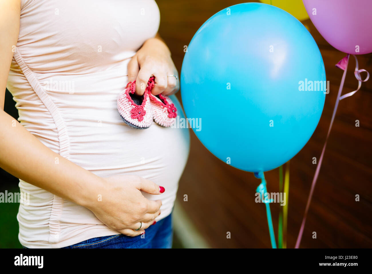 Happy pregnant woman expecting a girl Stock Photo - Alamy